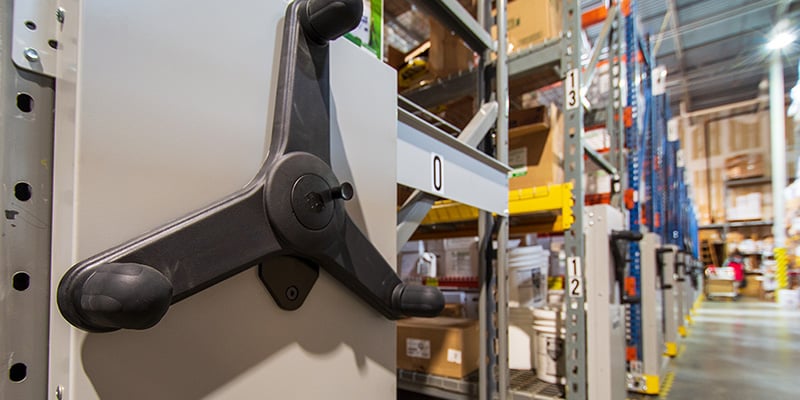 Reaching Operational Goals in Industrial Spaces With Mobile Racks Storage
