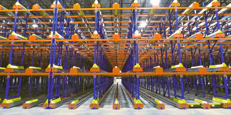 Reaching Operational Goals in Industrial Spaces With Mobile Racks Storage