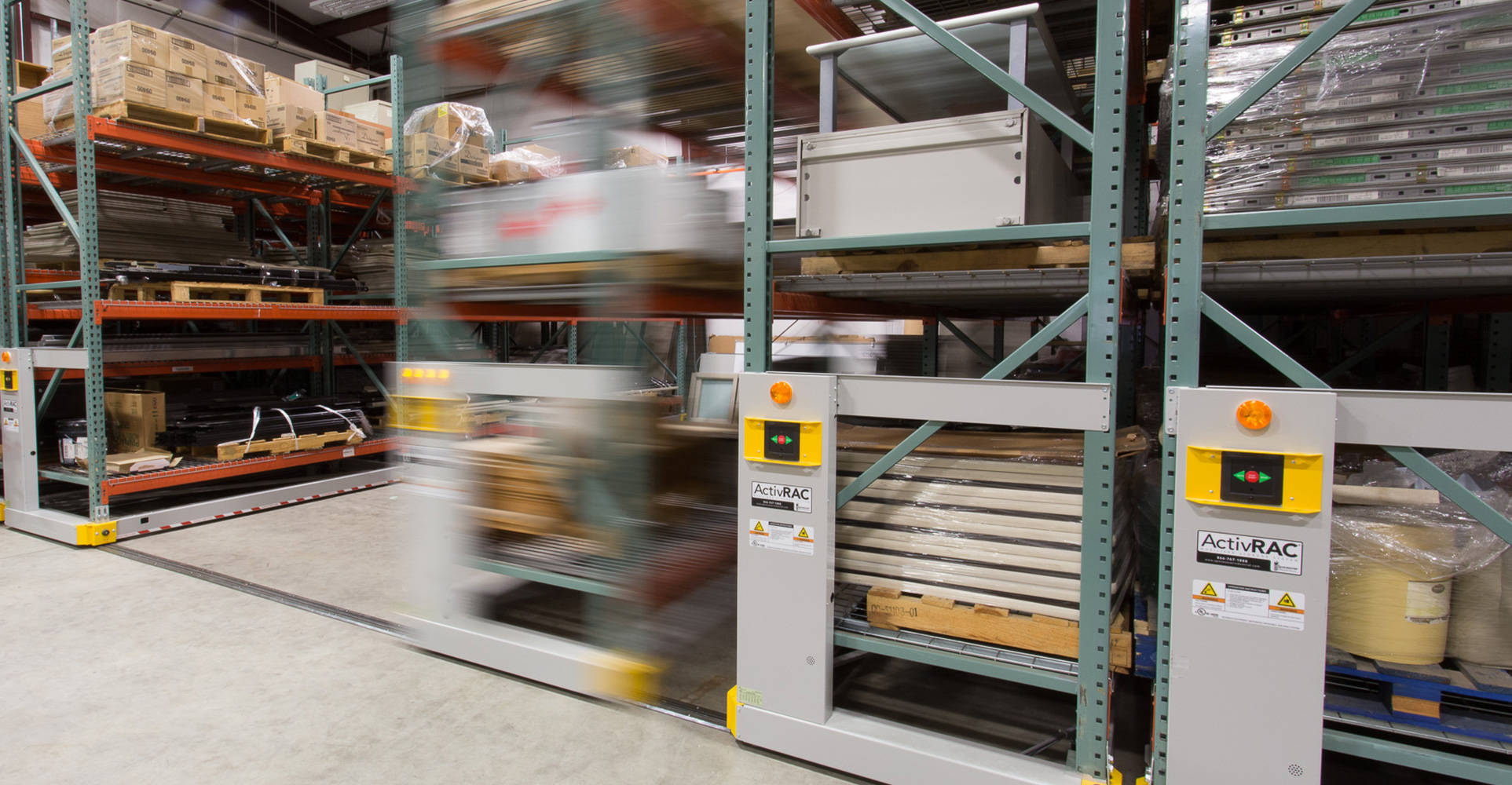 Reaching Operational Goals in Industrial Spaces With Mobile Racks Storage