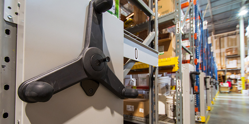 Reaching Operational Goals in Industrial Spaces With Mobile Racks Storage