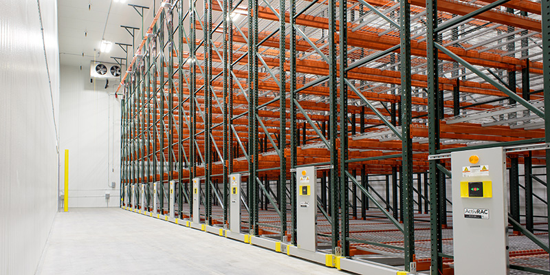 Reaching Operational Goals in Industrial Spaces With Mobile Racks Storage